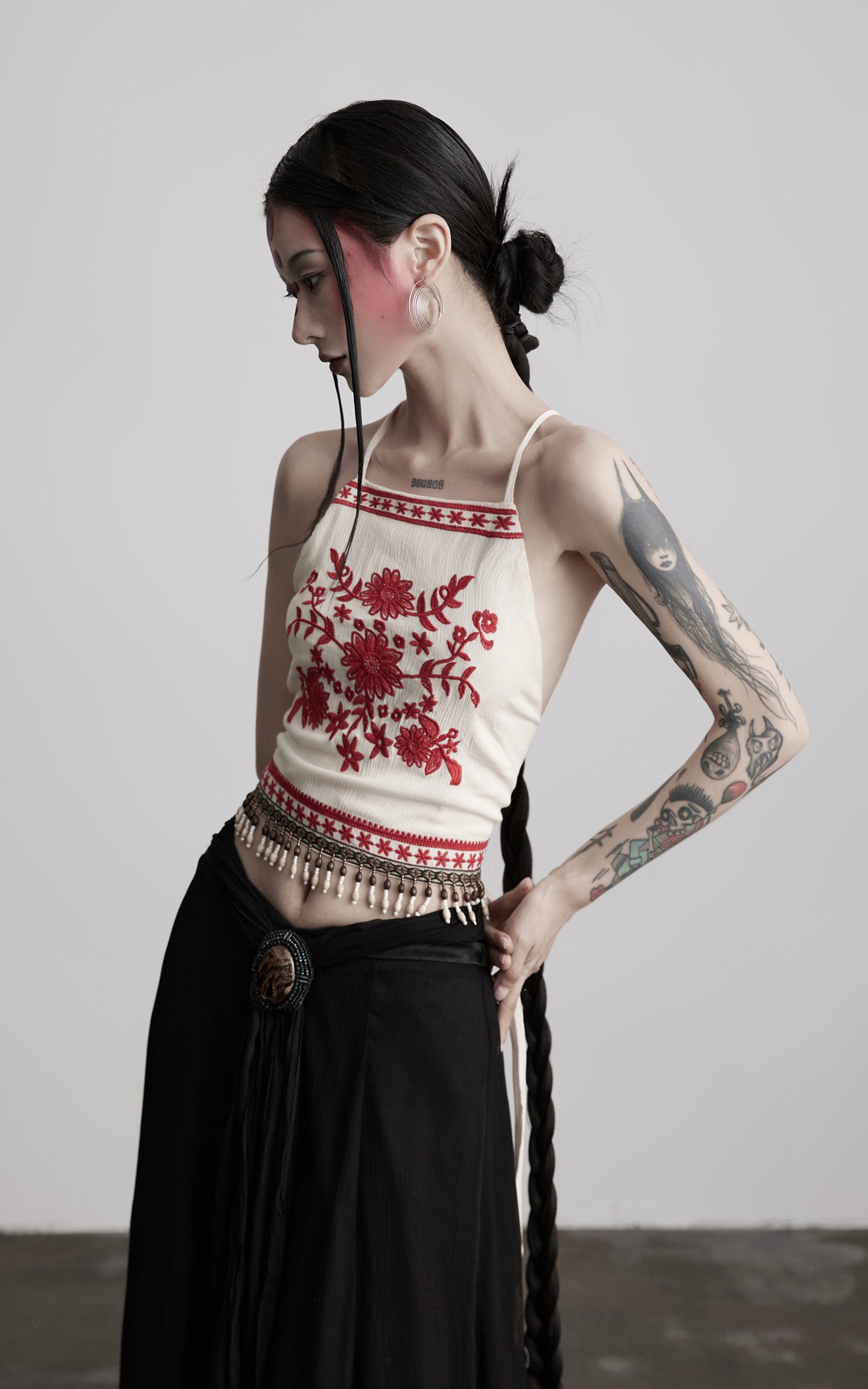 INDULGE Embroidered Halter Top with Floral Motif and Beaded Hem Detail